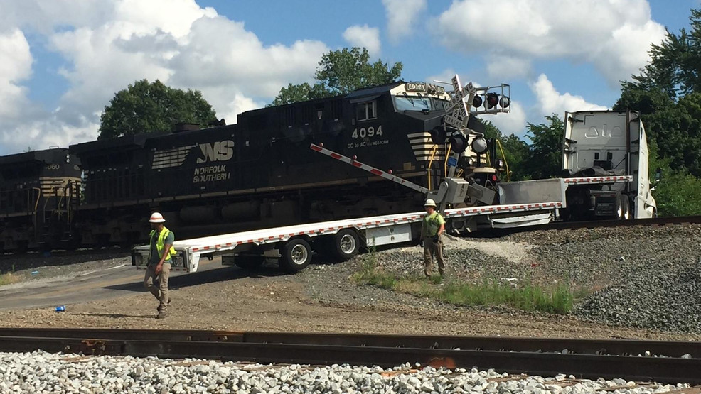 Semi hit by train after getting stuck on train tracks west of South ...